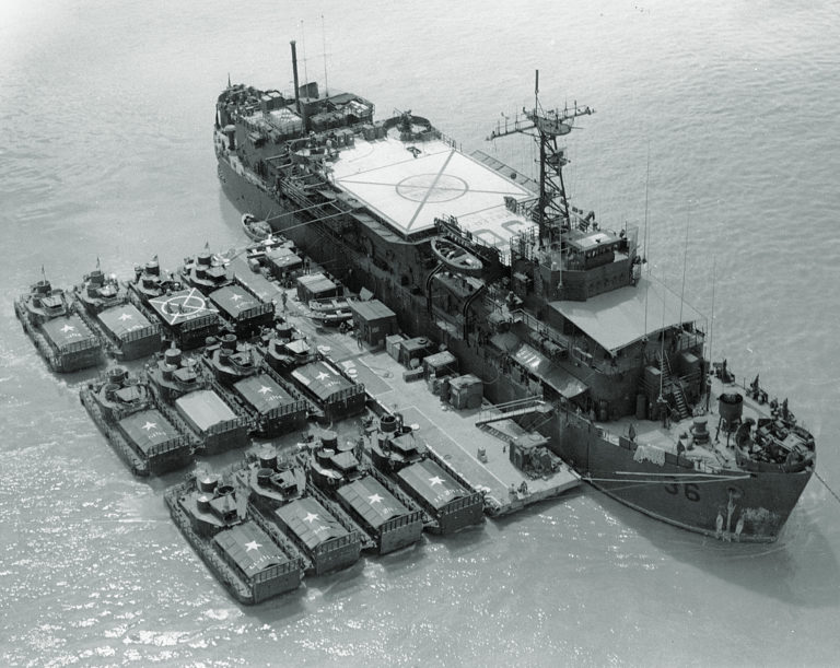 Small craft of the Mobile Riverine Force dock alongside their ...